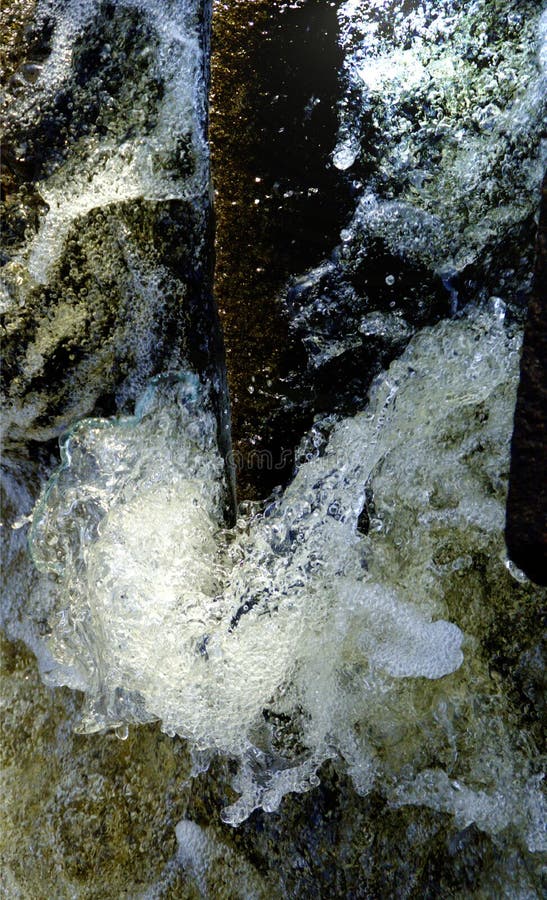 Breaking through, Sharp Stone in Water Stock Image - Image of ...