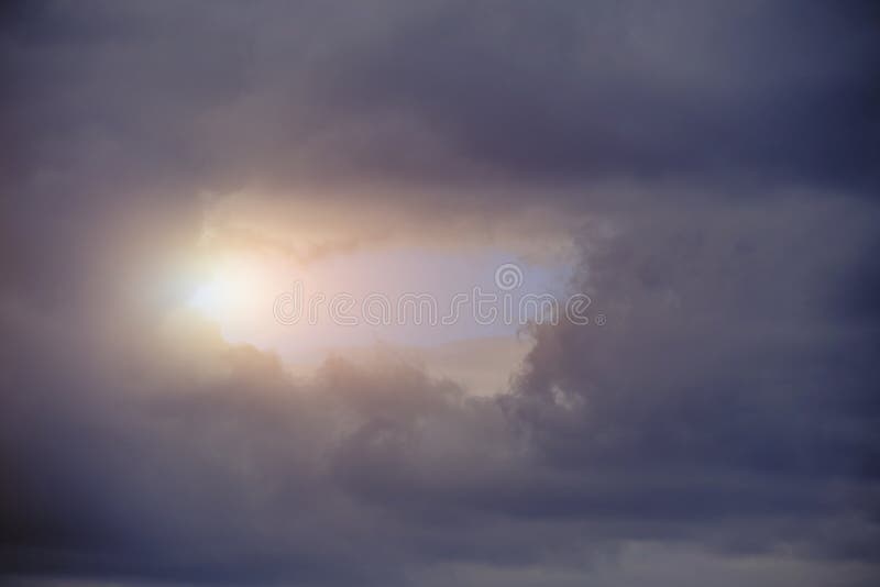 Breaking Sunlight through Gap of Storm Clouds. Stock Image - Image of ...