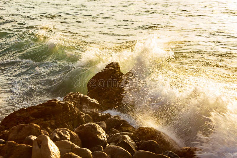 Breaking Wave with Foam on Rocky Shore, Splashing on Rocks Stock Image ...