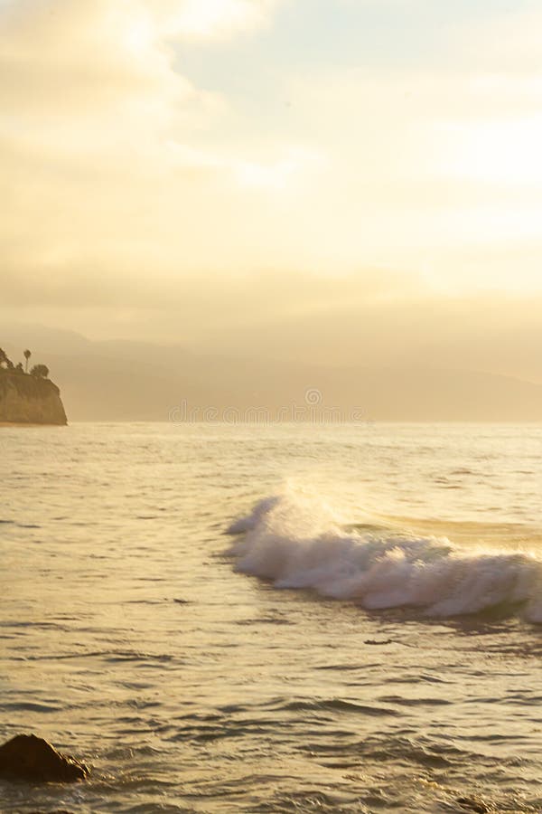 Breaking Wave with Foam on Yellow Ocean Expanse Stock Image - Image of ...