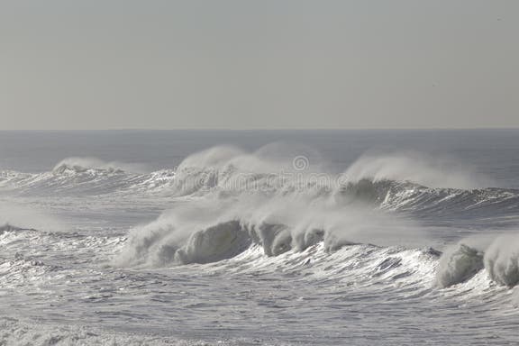 Breaking Wave with Wind Spray Stock Image - Image of beach, scenic ...