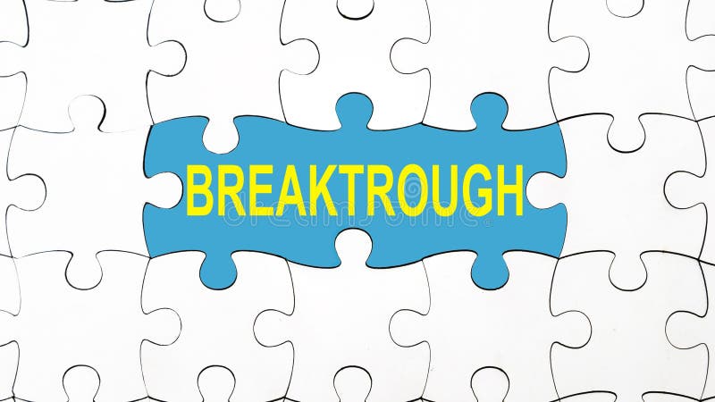 Breaktrough Text Under Jigsaw Puzzle, Life and Business Improvement ...