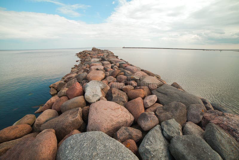 Breakwater. stock image. Image of horizon, water, cloud - 25958885