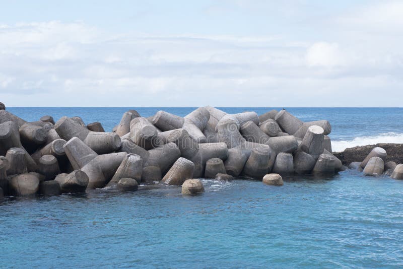 Breakwater Blocks at the Waterfront for Waves Protection Stock Image ...