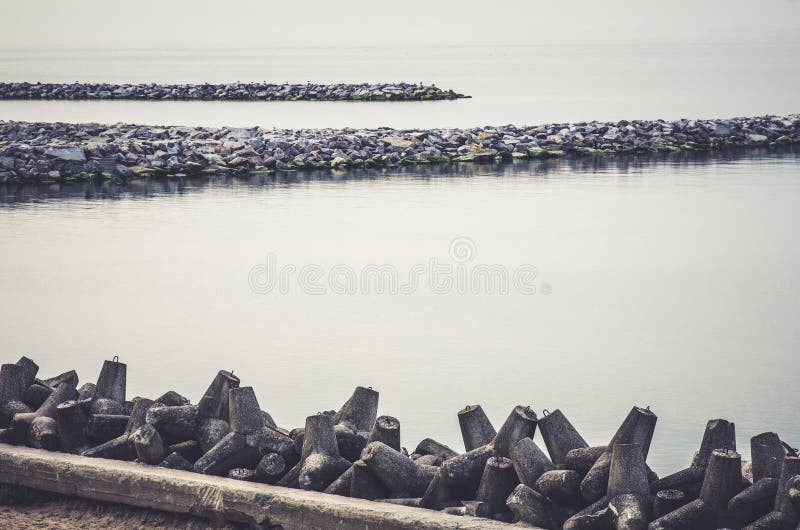 The Breakwater in the Form of a Strip of Stones Stretches Out into the ...