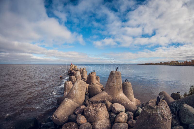 Breakwater on the Lake Protects the Shore from the Waves Stock Photo ...