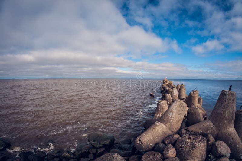 Breakwater on the Lake Protects the Shore from the Waves Stock Photo ...