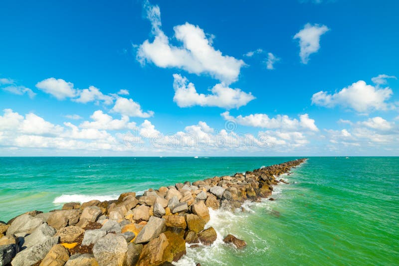 Breakwater in Miami Beach Coastline Stock Image - Image of shoreline ...