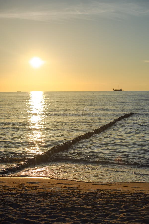 Breakwaters in the Baltic Sea Over the Sunset Stock Image - Image of ...