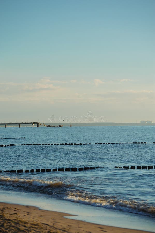 Breakwaters in the Baltic Sea Over the Sunset Stock Image - Image of ...