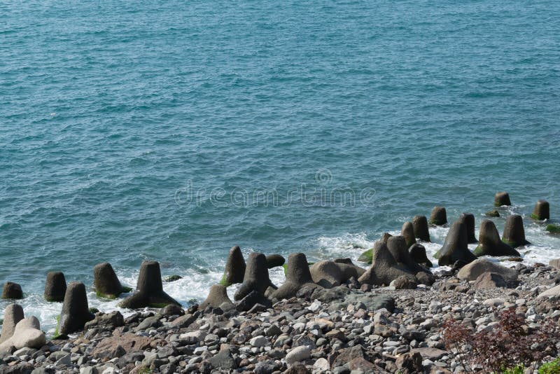 Breakwaters on the Seashore. Blue Ocean. Seascape Stock Photo - Image ...