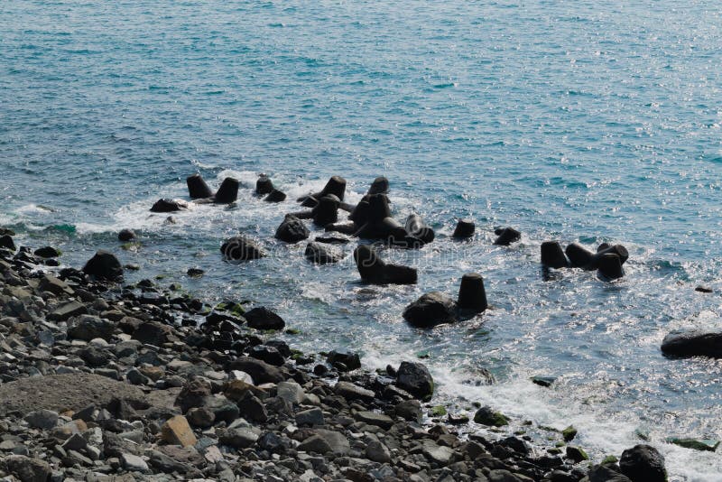 Breakwaters on the Seashore. Blue Ocean Stock Image - Image of ...