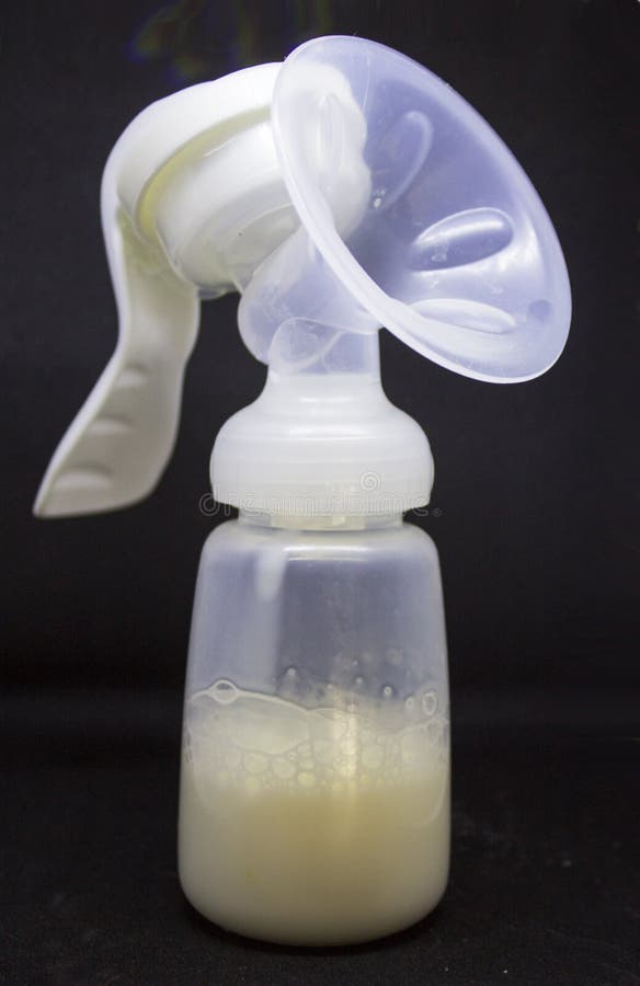 Breast pump with milk stock image. Image of lactation - 109930787