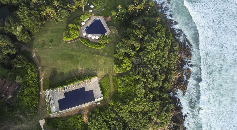 Breathtaking Aerial View of Luxurious Oceanfront Property with Pools ...
