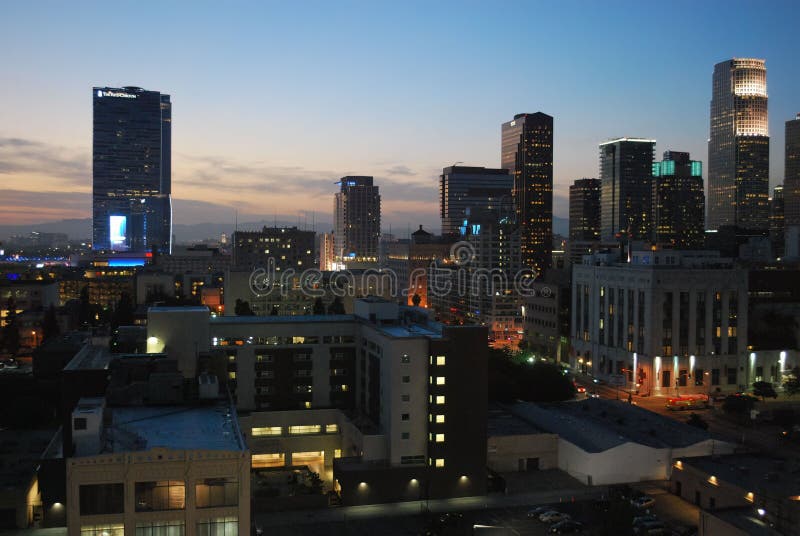 Breathtaking Aerial View of a Vibrant City Illuminated by Nightfall ...