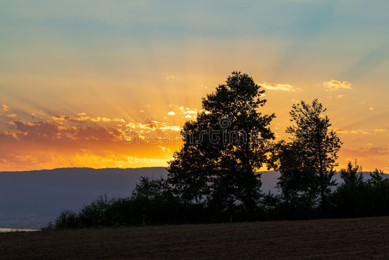 Breathtaking Landscape Featuring a Vibrant Sunset Sky Over an ...