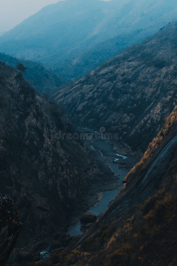 Breathtaking Landscape of a River Flowing in the Valley between High ...