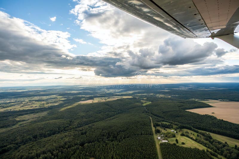 Skyline Horizon - Panoramic View from a Plane Window with Clouds and ...