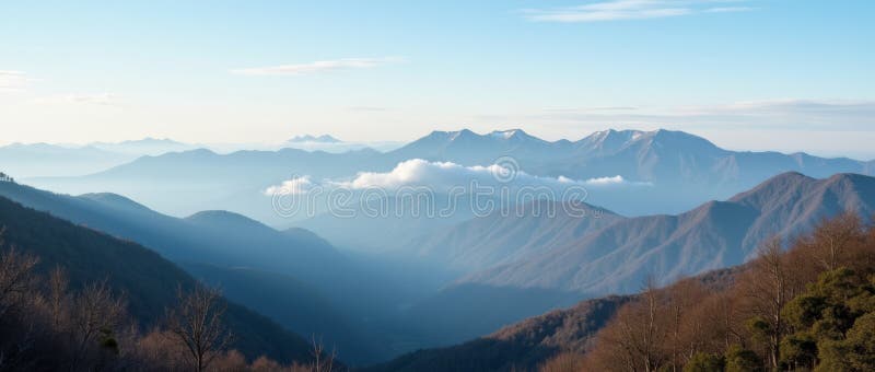 Breathtaking Panoramic View of a Mountain Range with Low-Lying Clouds ...