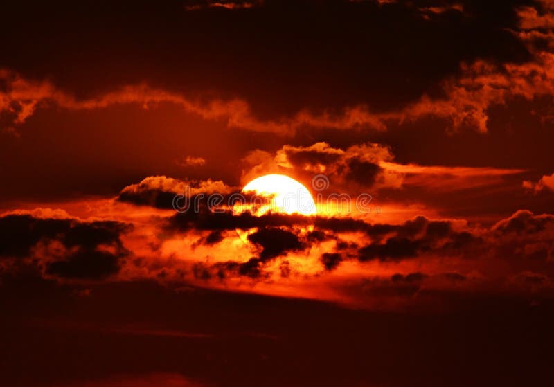 Breathtaking Scenery of the Sun Setting in the Cloudy Golden Sky Stock ...