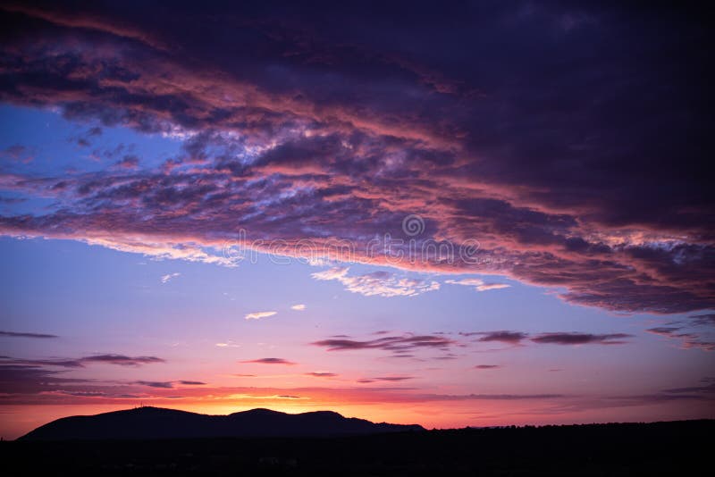 Breathtaking Shot of a Beautiful Sunset with Unique Colors in the ...