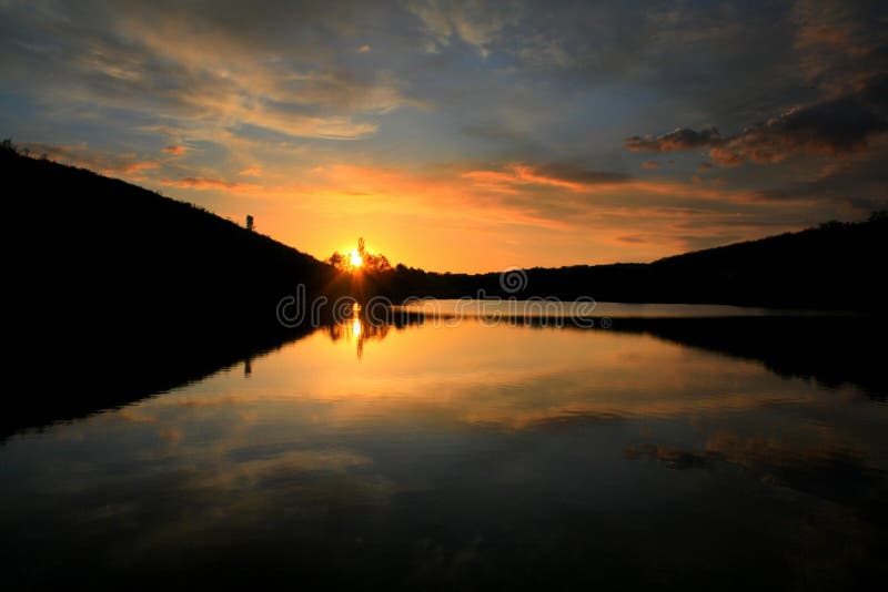 Breathtaking Shot of a Sunset Over the Lake Stock Photo - Image of ...