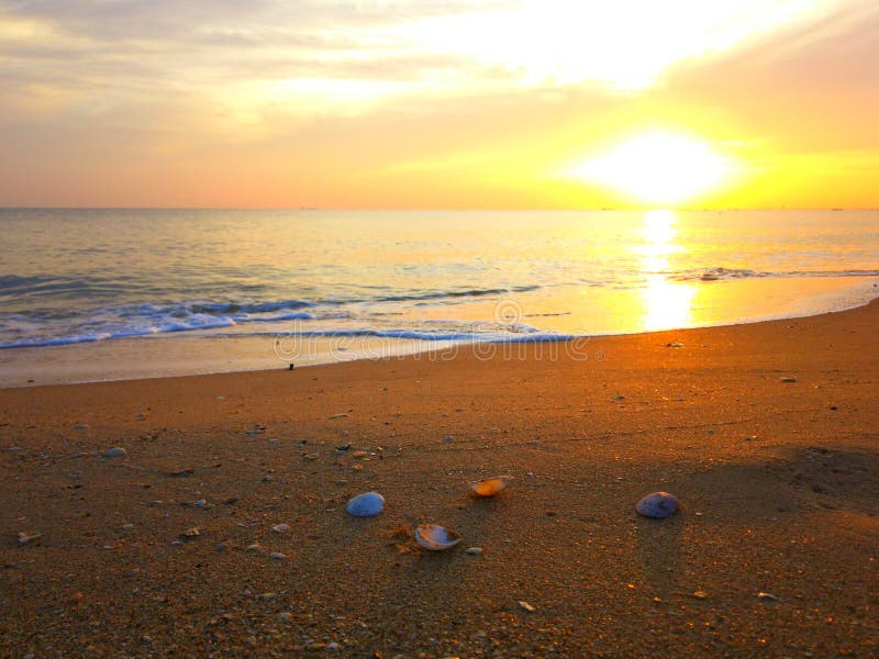 Breathtaking Sunset Captured at the Beach Stock Photo - Image of clouds ...