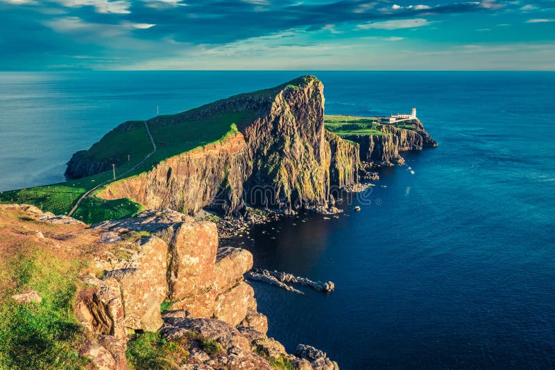 Breathtaking Sunset at the Neist Point Lighthouse, Scotland Stock Image ...