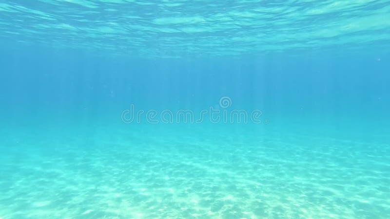 Underwater View of a Crystal-clear Sea with Its Waves Reflecting ...