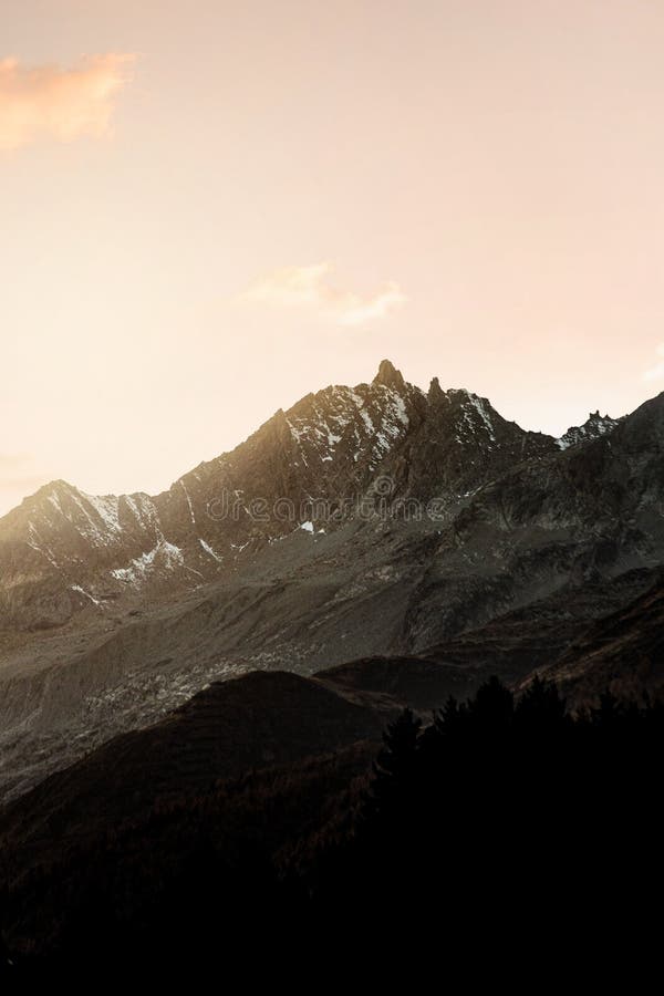 Breathtaking Vertical Shot of the Rocky Mountains at a Sunrise Stock ...