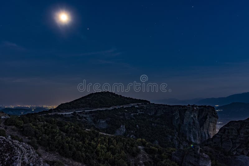 Breathtaking View of the Cliffs Captured Under the Full Moon in the Sky ...