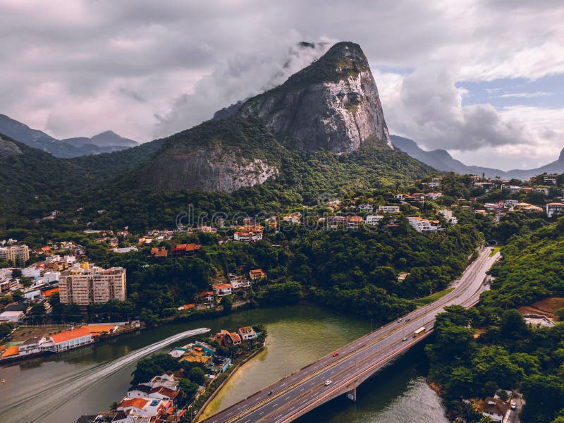 Breathtaking View of Clouds Rolling Past a Mountain with Surrounding ...