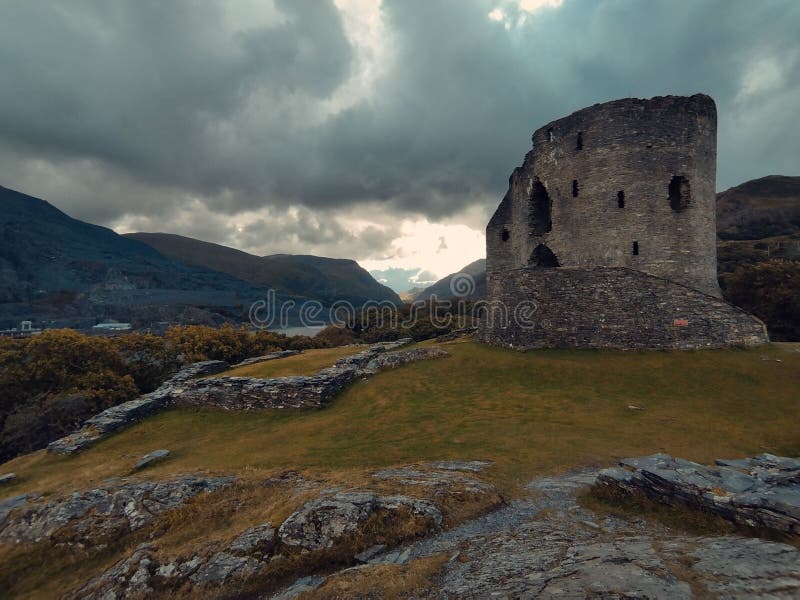 Breathtaking View of Dolbadarn Castle Under Dramatic Cloudy Sky in ...