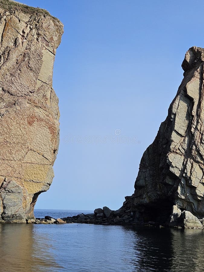 Hidden Rocky Cove with Towering Limestone Walls and Turquoise Waters ...