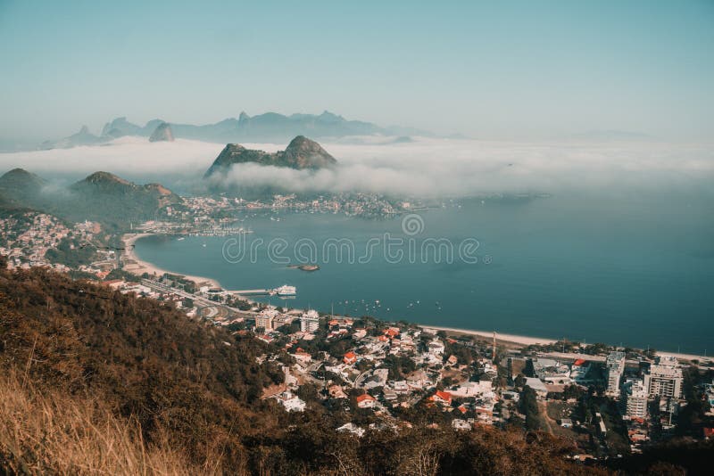 Breathtaking View of the Mountains Covered in Clouds on the Ocean in ...