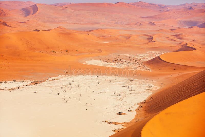Red sand dunes of Namibia stock photo. Image of hiking - 158610082