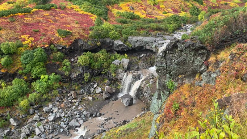 A Breathtaking View of a Two-stage Waterfall that Turns into a Small ...