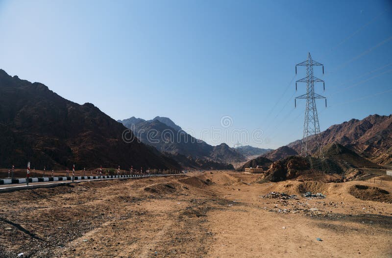 Expansive Desert Landscape Featuring Majestic Mountains and Abandoned ...