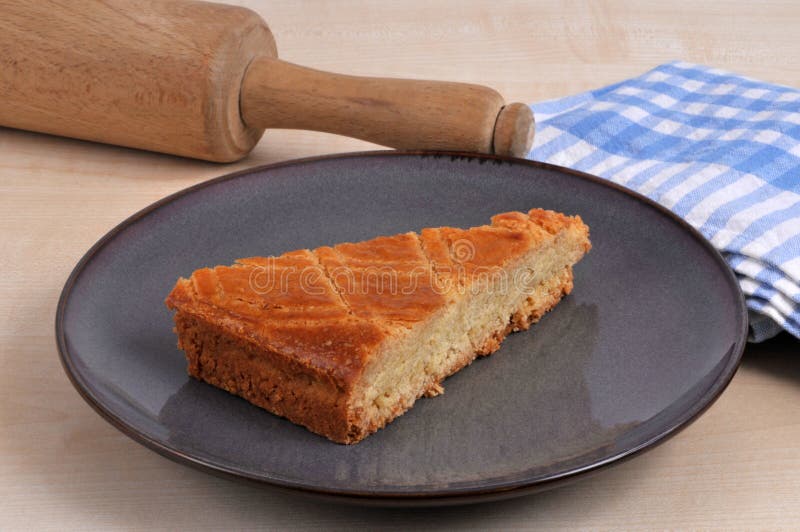 Breton cake on a plate stock photo. Image of rolling - 308908698