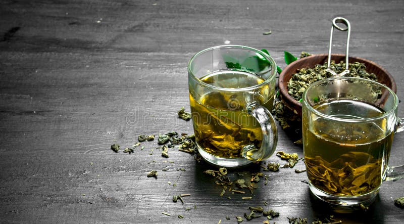 Brewed fragrant green tea. stock image. Image of leaf - 107418851