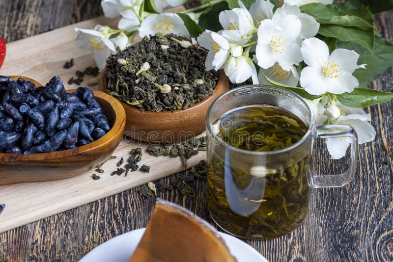 Brewed Green Tea with Jasmine on the Table Stock Photo - Image of dried ...