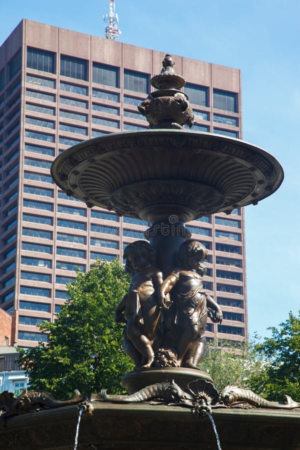 Brewer Fountain at Boston Common Park and a Modern Office Building ...