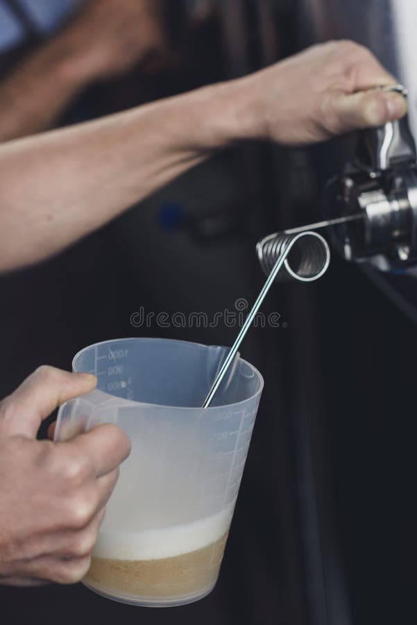 Brewery Worker Pouring Beer Stock Photo - Image of view, brewing: 96238854