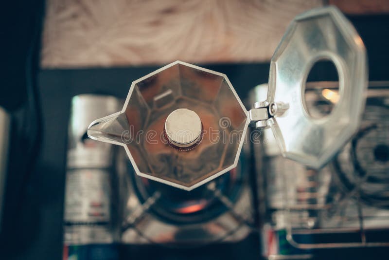 Brewing Black Moka Coffee Using Moka Coffee Maker and Boiling on Stove ...