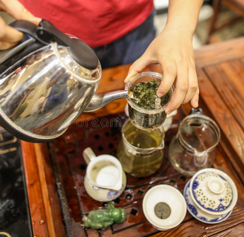 Brewing Chinese Tea from the Tea Leaves Stock Photo - Image of china ...