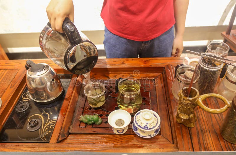 Brewing Chinese Tea from the Tea Leaves Stock Photo - Image of china ...