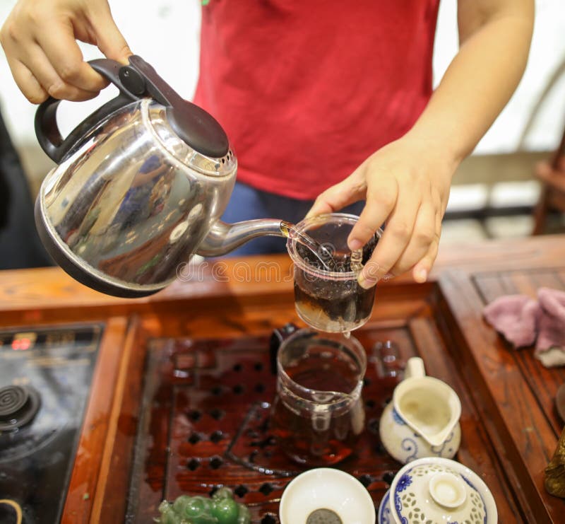 Brewing Chinese Tea from the Tea Leaves Stock Image - Image of brewing ...