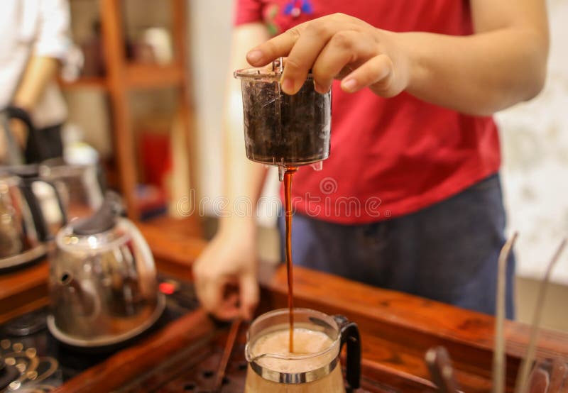 Brewing Chinese Tea from the Tea Leaves Stock Photo - Image of herb ...