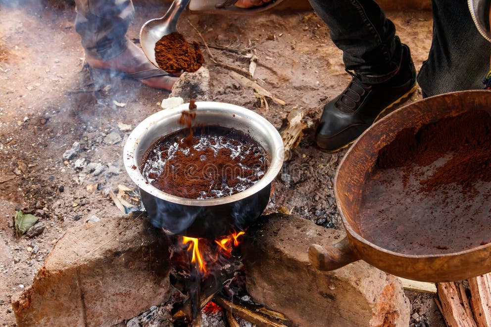 Brewing coffee on bonfire stock image. Image of coffee - 287550529