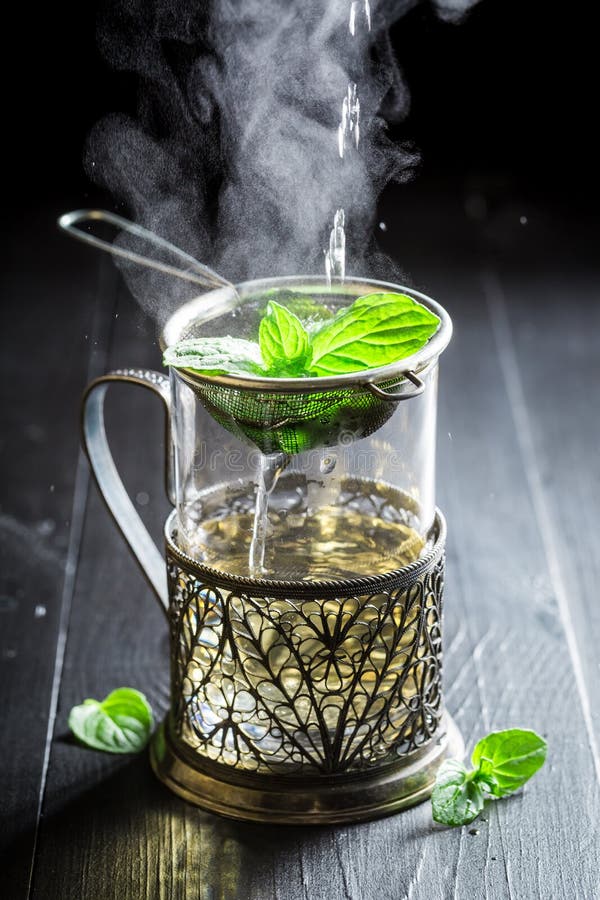 Brewing Fresh Green Tea in Filigrane Glass Stock Photo - Image of ...